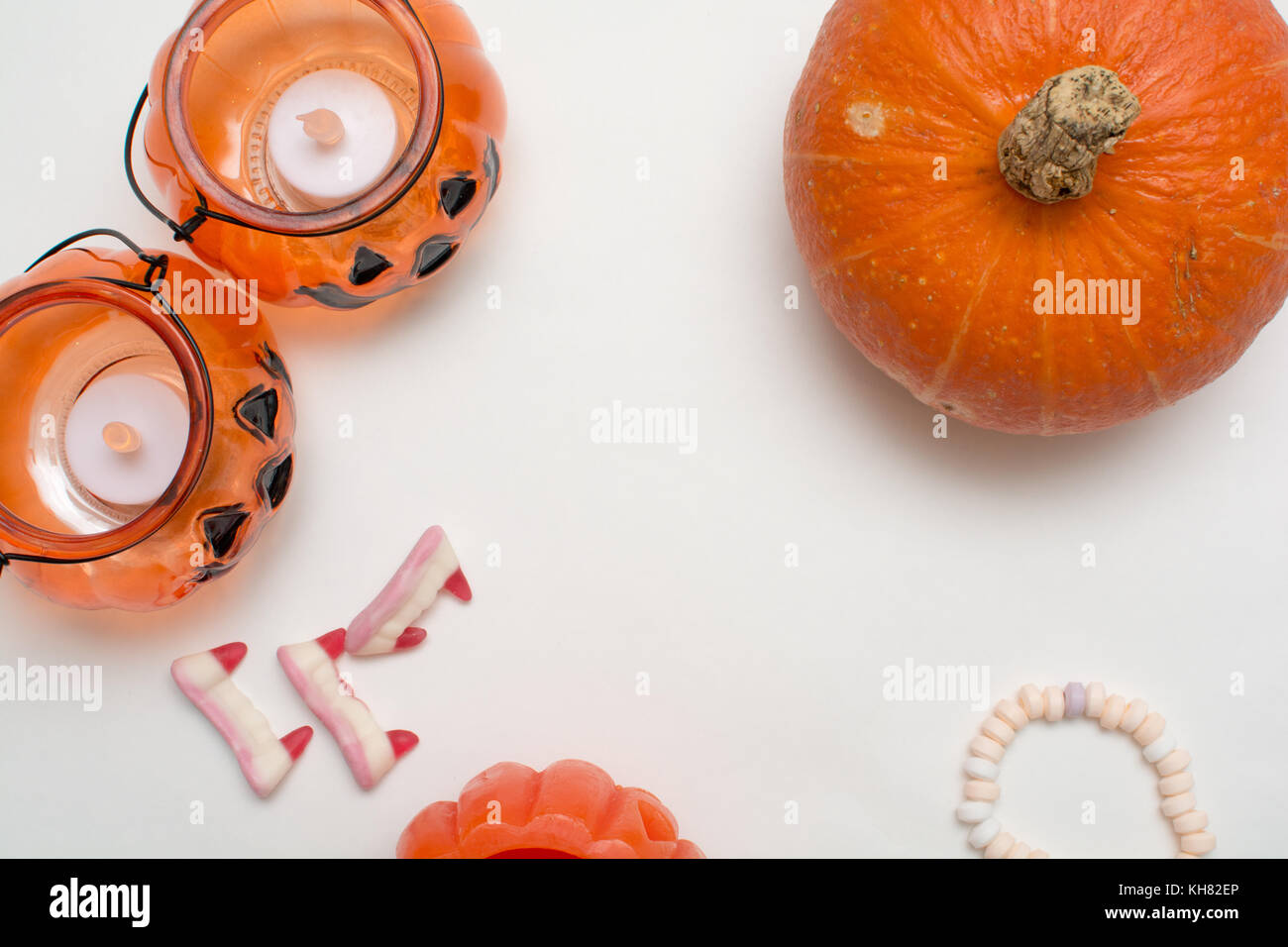 Halloween party objects arranged and isolated on a white background ...