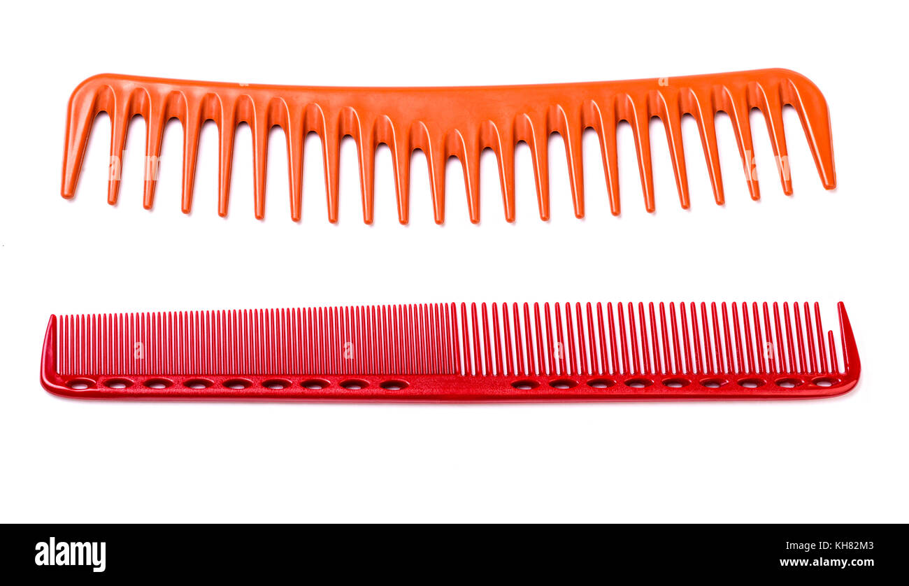 new red combs isolated on a white background Stock Photo - Alamy