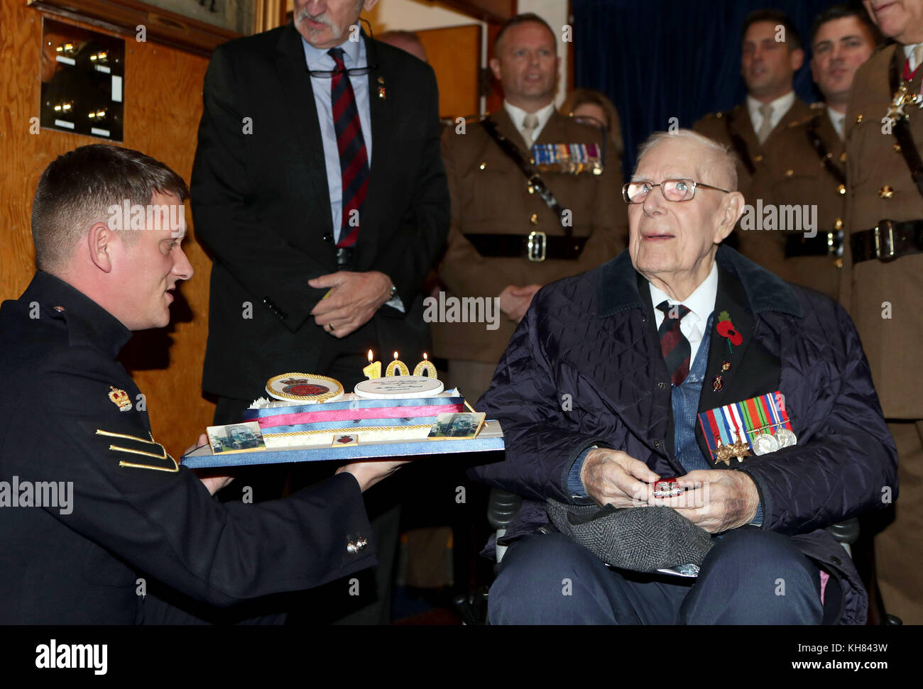 Corporal of Horse Walker with a birthday cake for WWII veteran Mr Alf ...