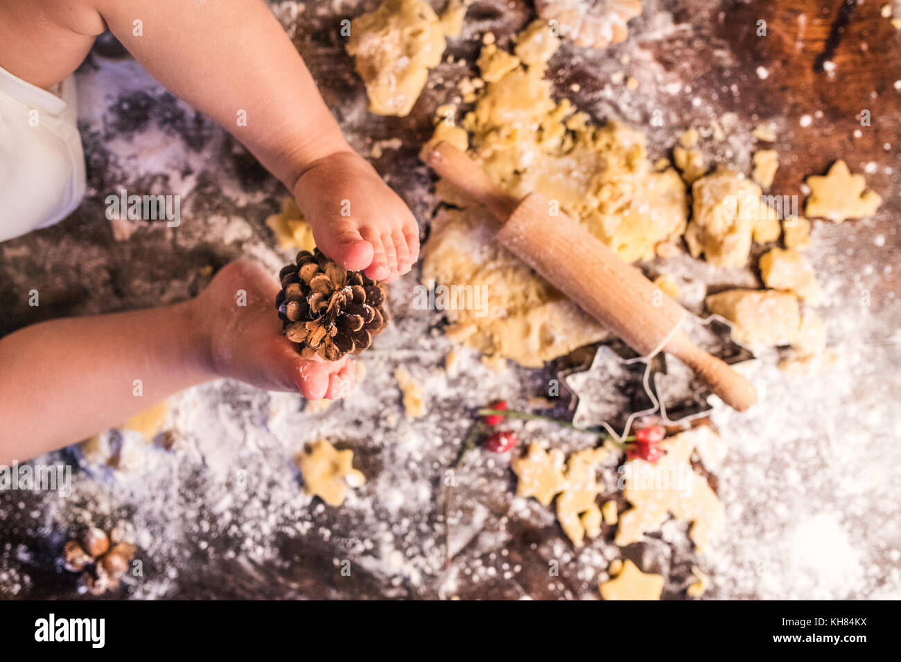 Young family making gingerbread cookies at home Stock Photo - Alamy