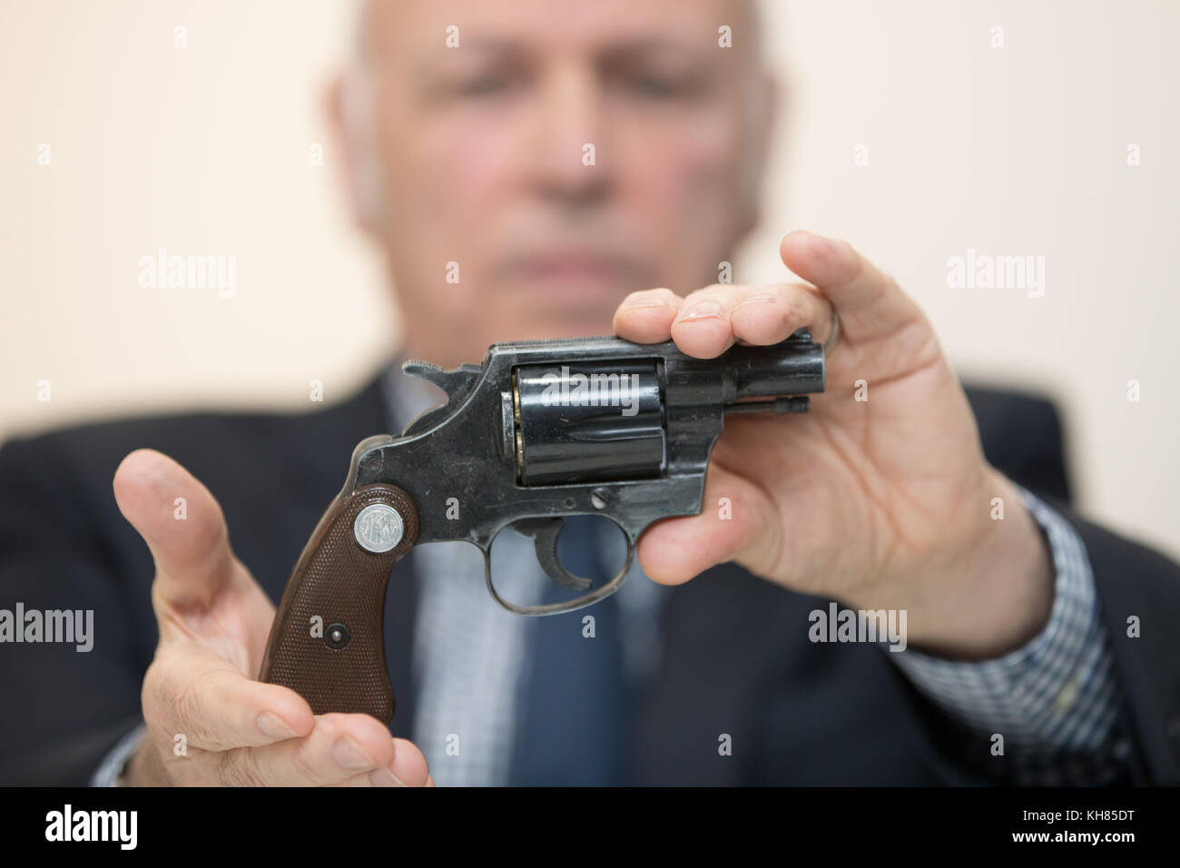 Ray Wilkinson holding a gun at Police Headquarters West Midlands Police ...
