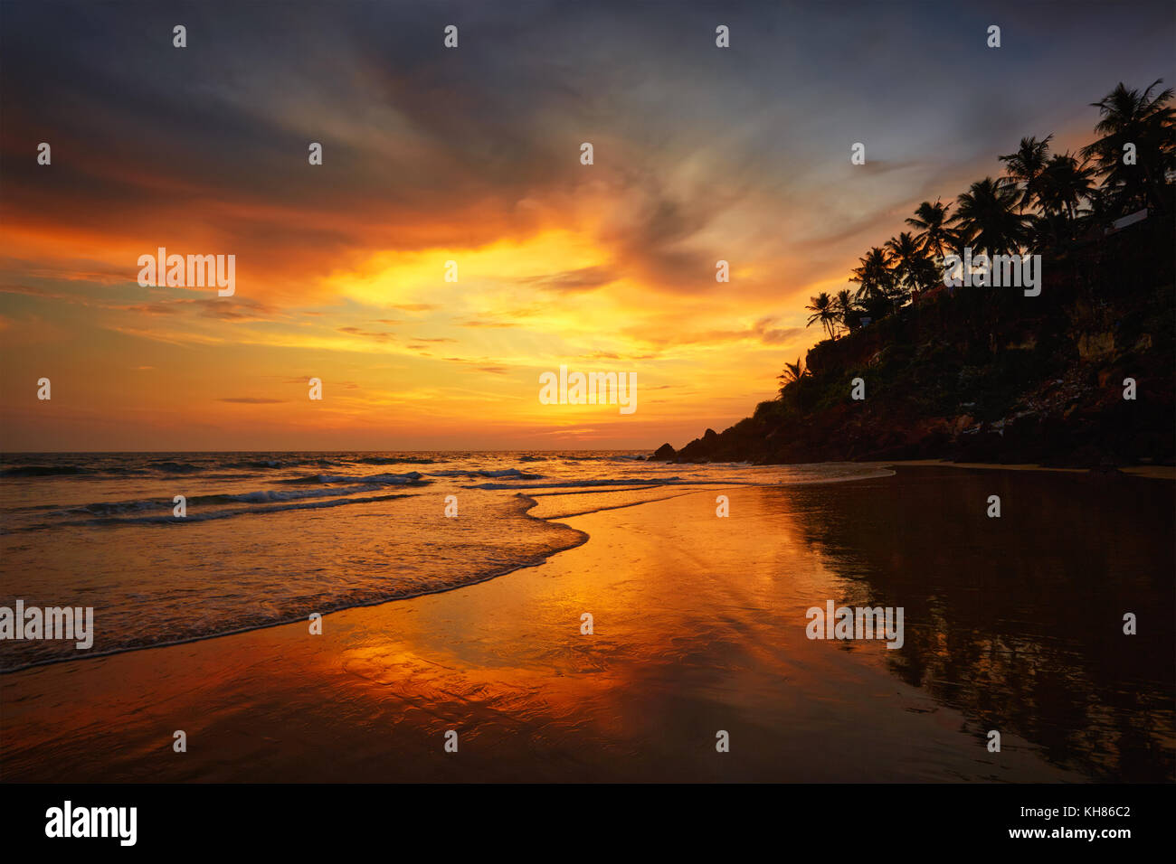 Sunset on Varkala beach, Kerala, India Stock Photo - Alamy