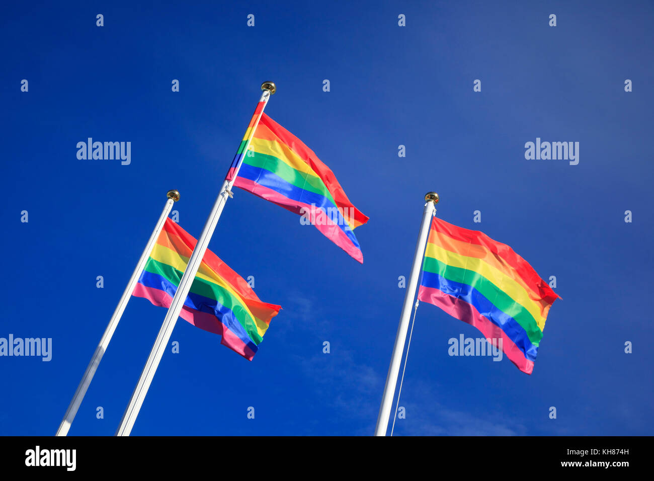Gay flags in blue sky Stock Photo - Alamy