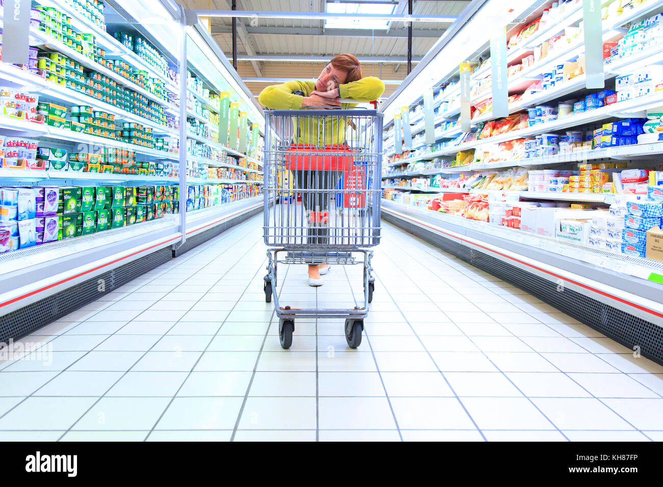 France, sad woman in a supermarket Stock Photo - Alamy