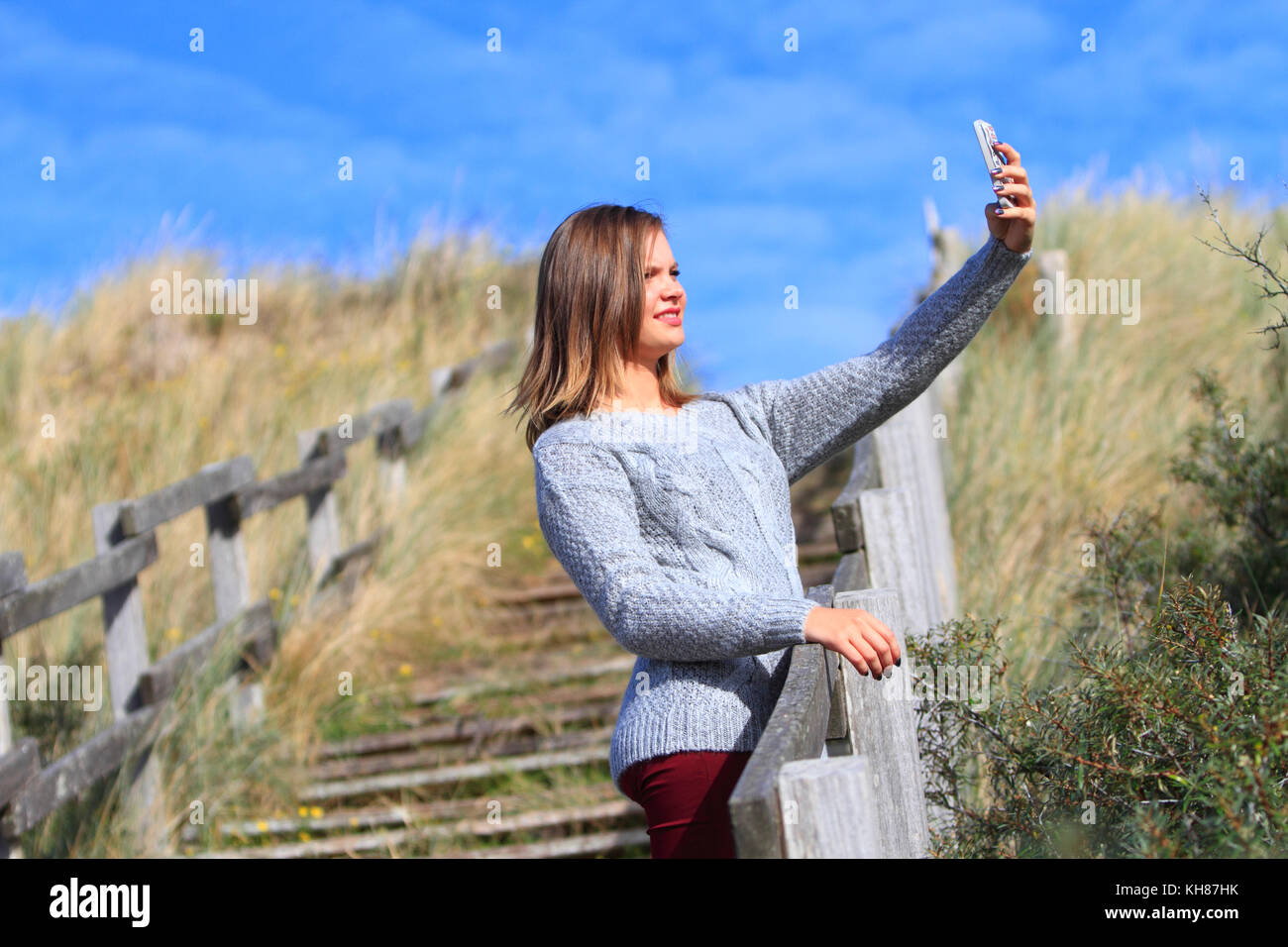 France, woman doing selfie Stock Photo - Alamy