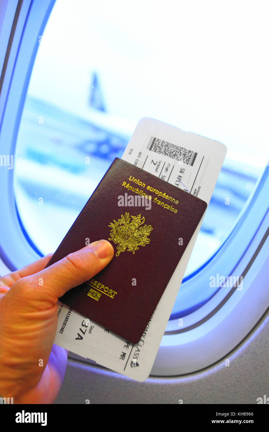 Passport in aircraft Stock Photo - Alamy