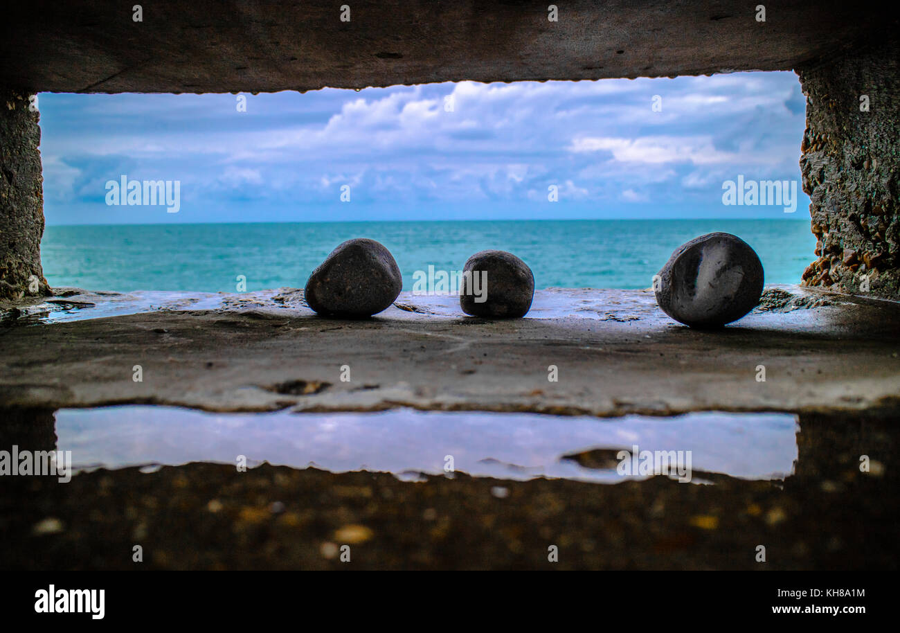 The three stones trough a window Stock Photo - Alamy