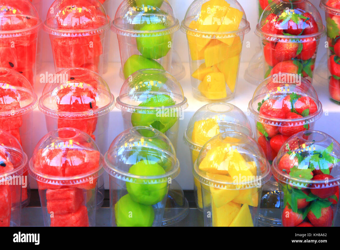 Fresh fruits in plastic glasses Stock Photo - Alamy