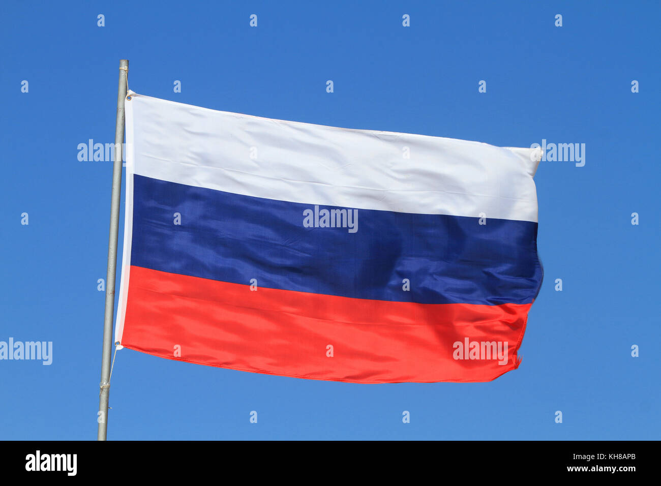 Russian flag in blue sky Stock Photo - Alamy
