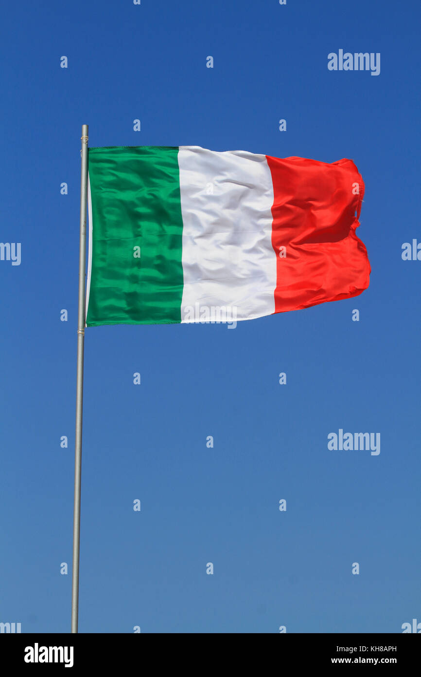 Italia flag in blue sky Stock Photo - Alamy