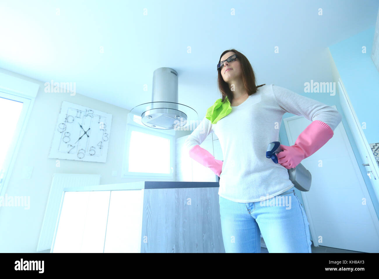 Woman tidying house hair hi-res stock photography and images - Alamy