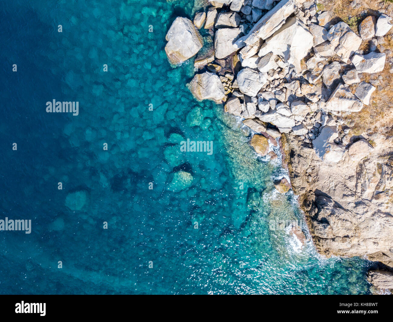 Aerial view of rocks on the sea. Overview of the seabed seen from above ...