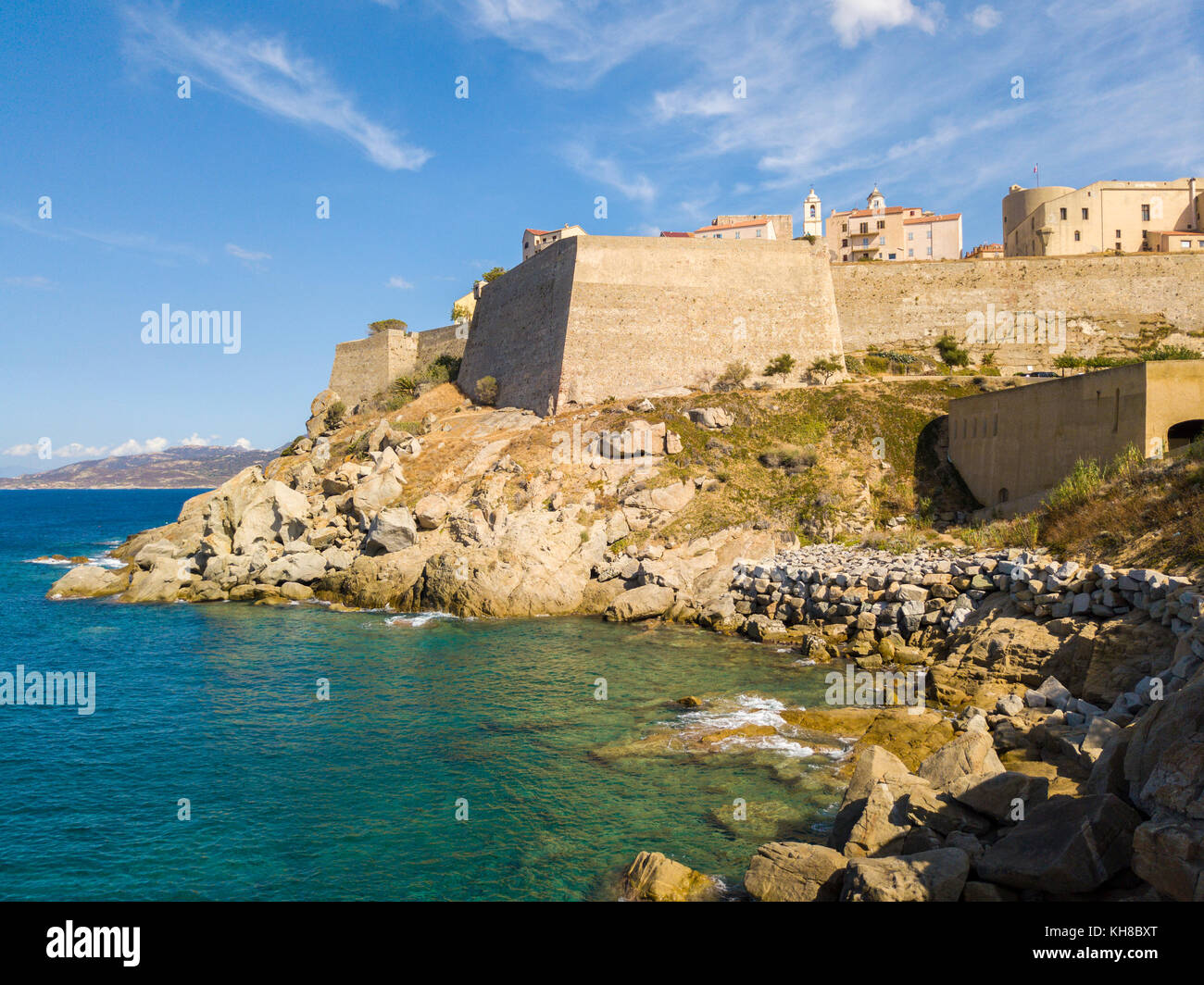 Aerial view of Calvi city, Corsica, France. Walls of the city, cliff ...