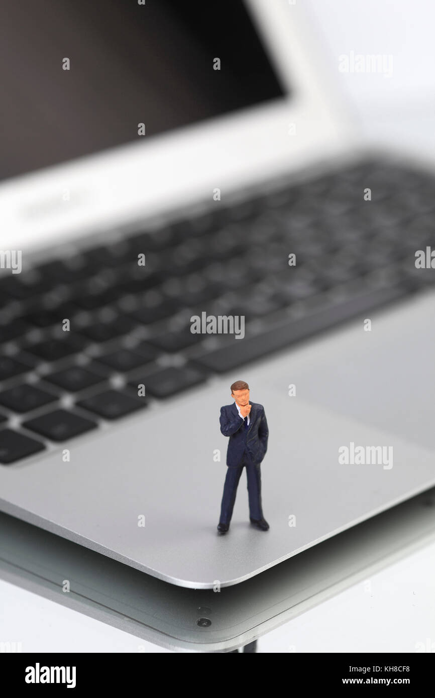 Computer and man Stock Photo - Alamy