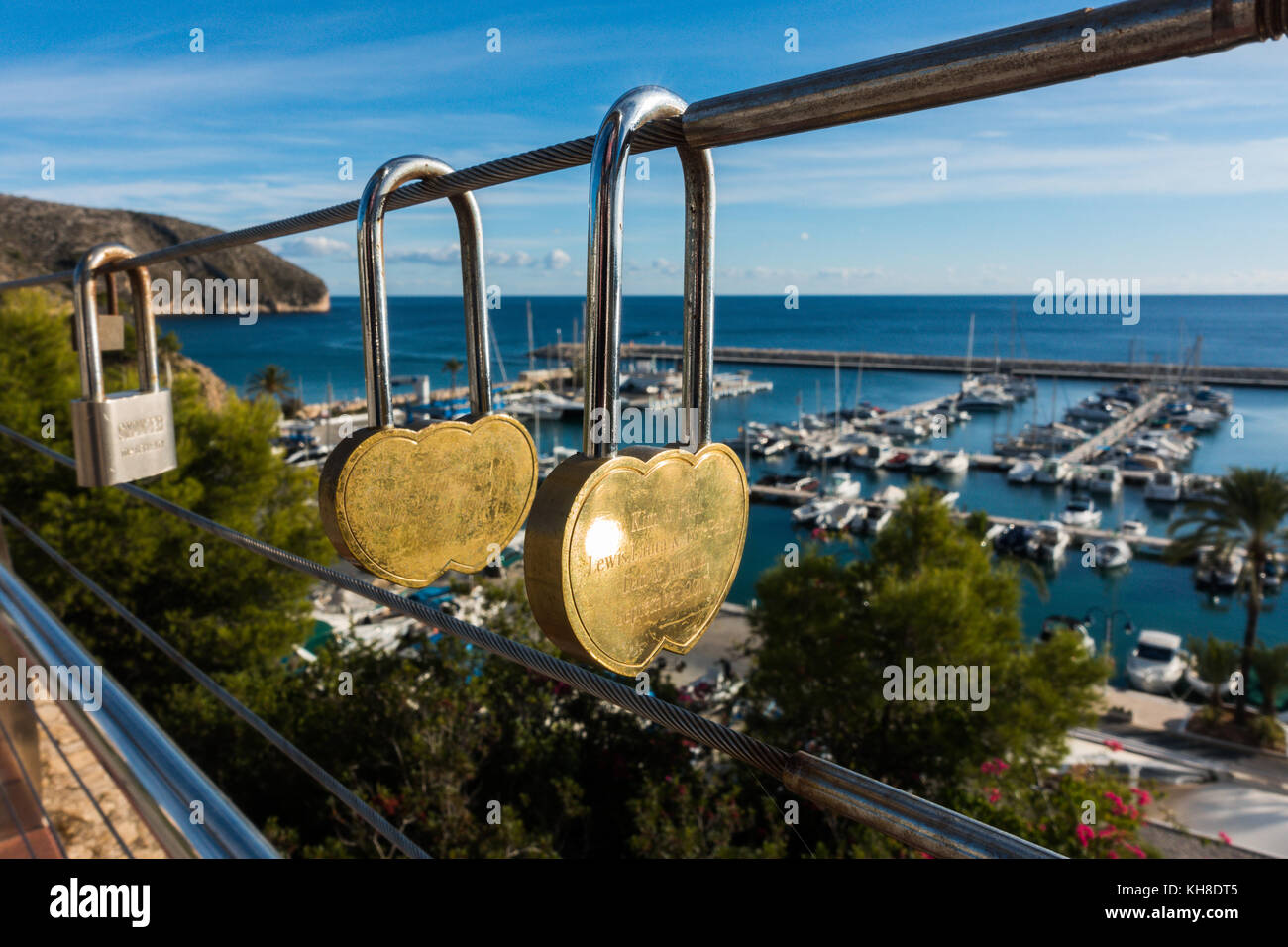 Love locks, padlocks on metal rail overlooking marina, moraira, spain ...