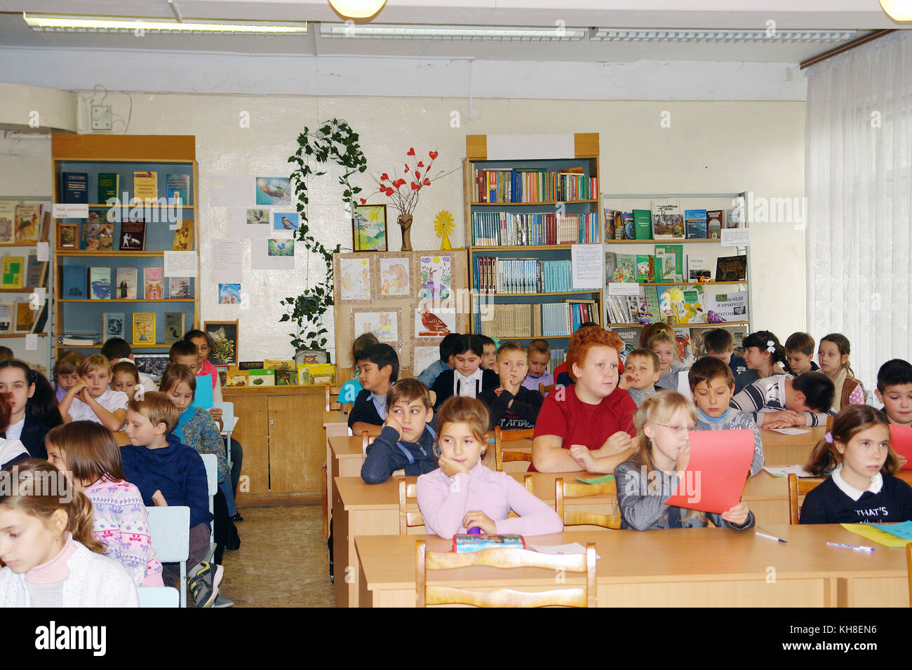 Pupils sit in class at their desks Stock Photo - Alamy