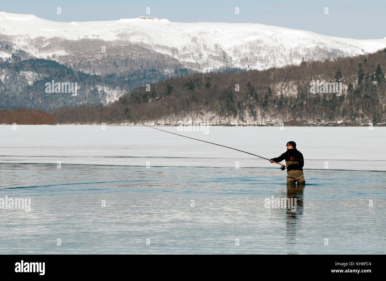 Japan, Hokkaido, Fisherman in winter *** Local Caption *** landscape ...