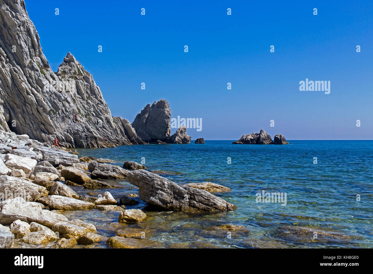 A secluded beach on the Italian Coast with blue translucent water ...
