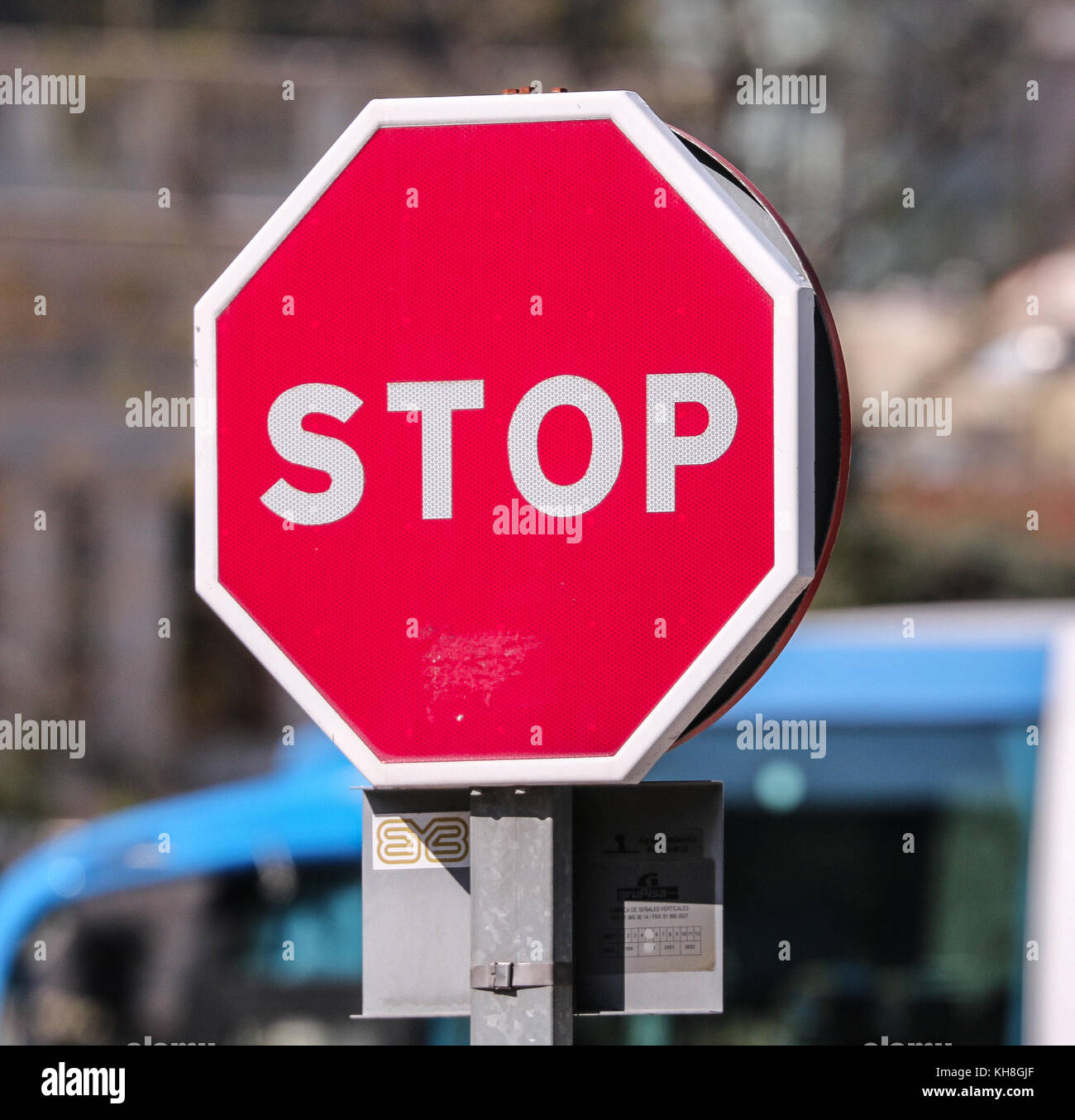 Red Stop Sign shallow depth of field at an intersection in Madrid ...