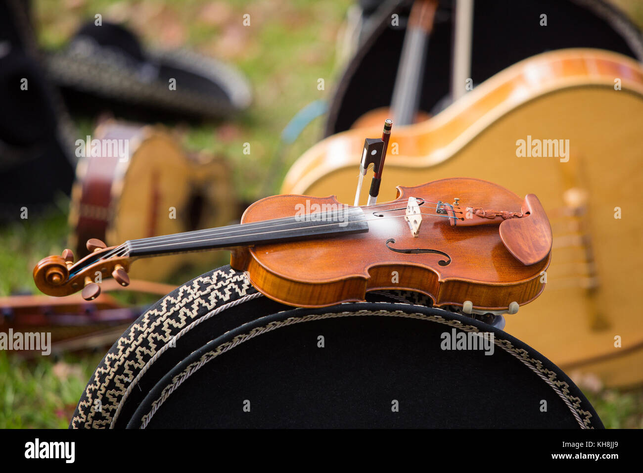 Mariachi instruments on the ground Stock Photo - Alamy