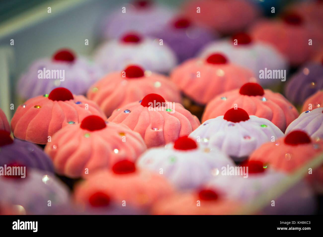 Pink artificial Cupcakes toy kids Stock Photo - Alamy