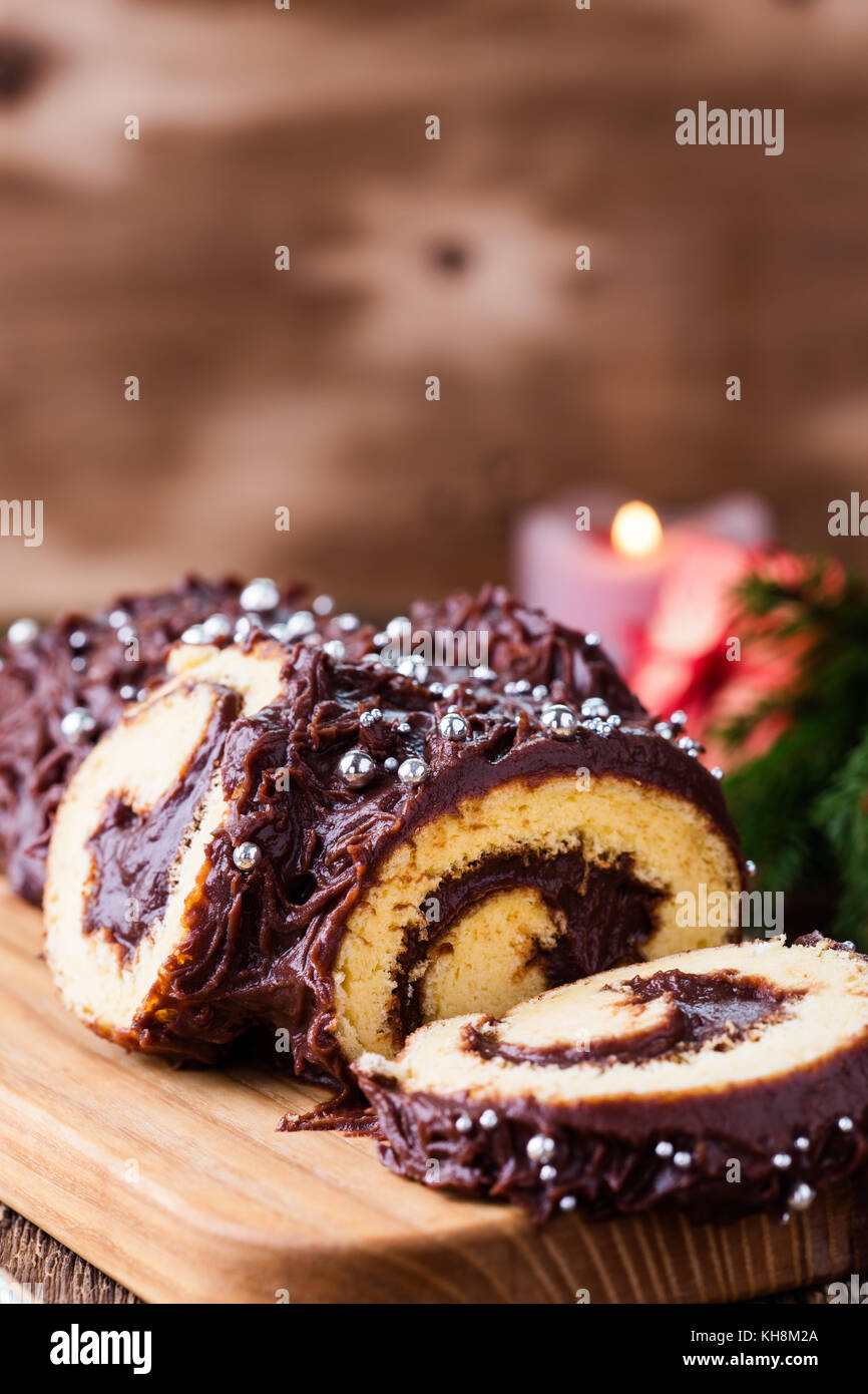 Christmas chocolate log, Buche de Noel, festive holiday cake on rustic ...
