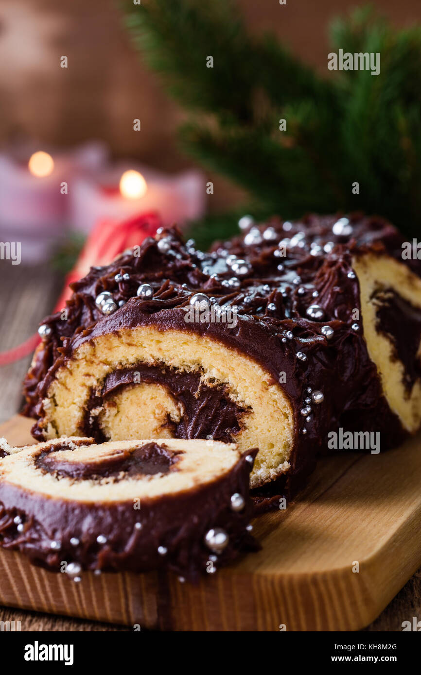 Christmas chocolate log, Buche de Noel, festive holiday cake on rustic ...