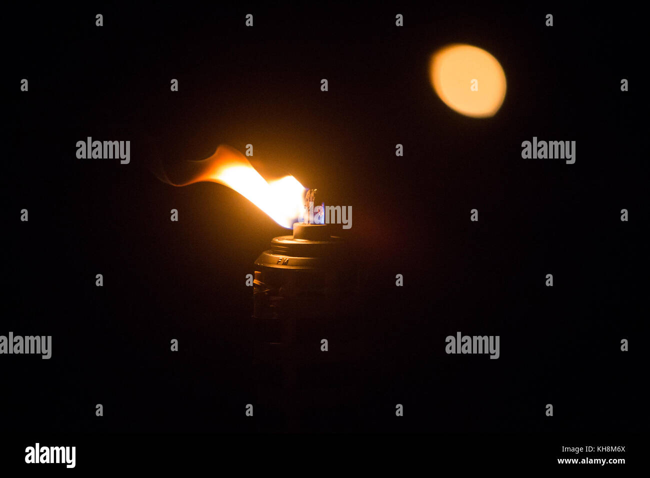 Flaming bamboo Torch at night Stock Photo - Alamy