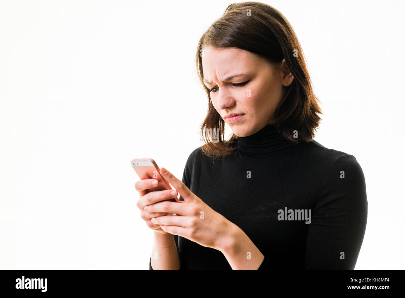 Teen Phone Confused Face High Resolution Stock Photography and Images ...