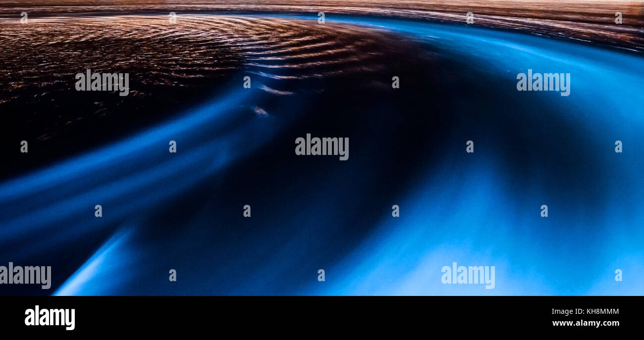 Glowing waters at glistening lagoon Stock Photo - Alamy