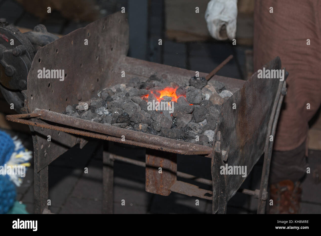 A Forging Furnace: Blacksmith Working Iron and Incandescent Charcoal ...