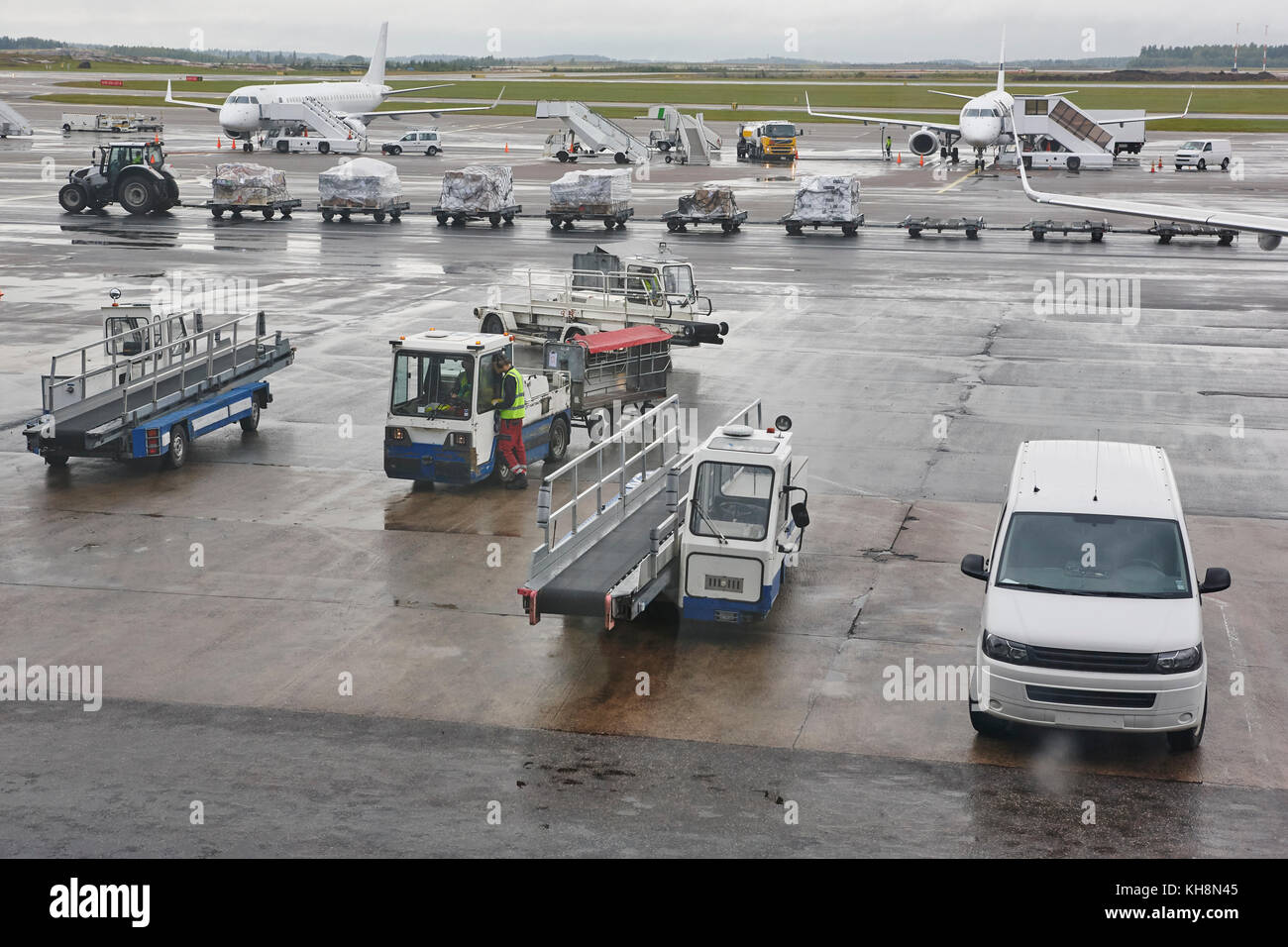 Airport runaway traffic on a rainy day. Travel background. Horizontal ...