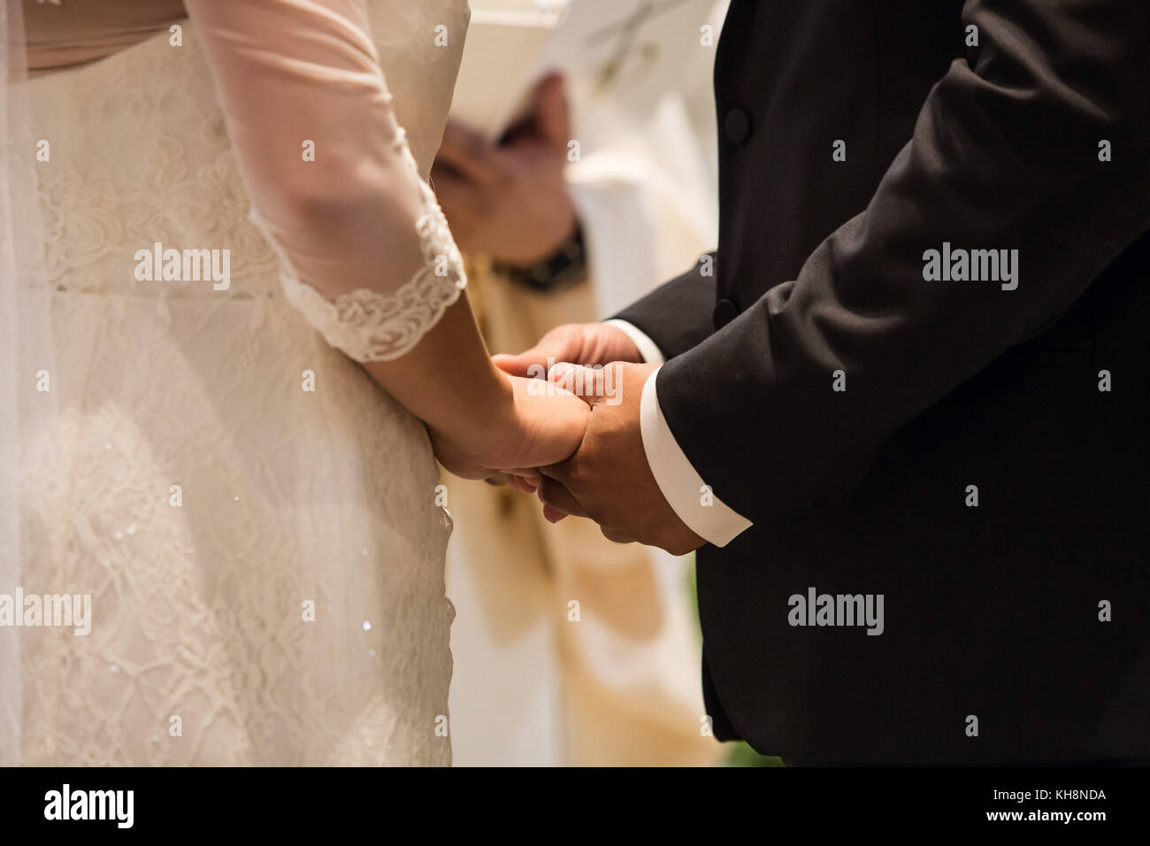 Bride and groom rings at the ceremony Stock Photo - Alamy