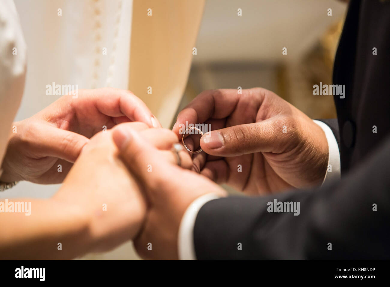 Bride and groom rings at the ceremony Stock Photo - Alamy