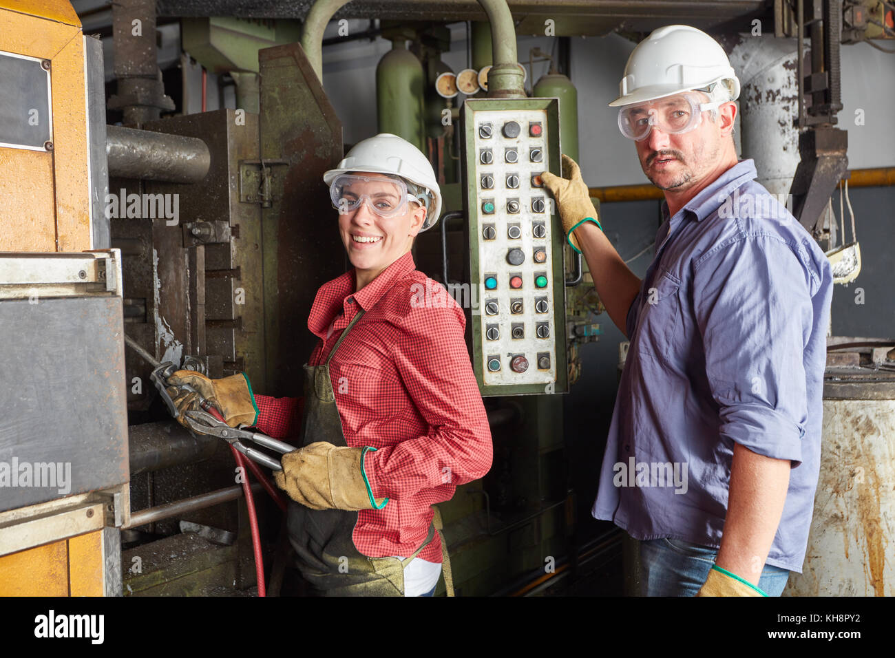 Factory control center of production with service team Stock Photo - Alamy