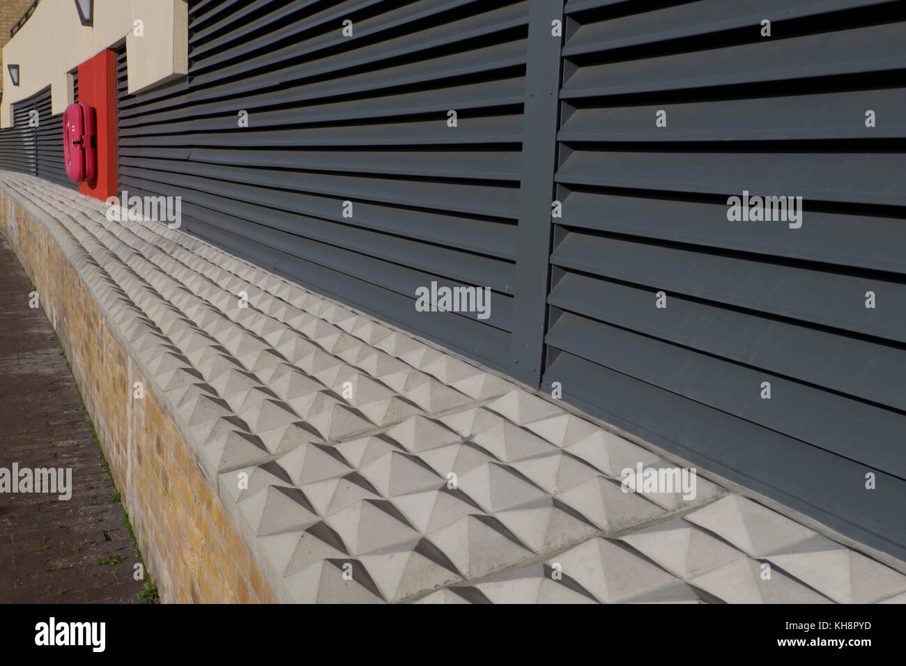 Anti-homeless spikes and rough surfaces installed in a luxury housing ...