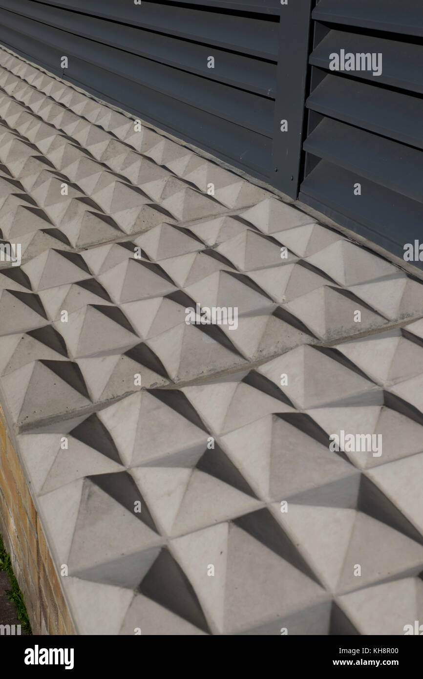 Anti-homeless spikes and rough surfaces installed in a luxury housing ...