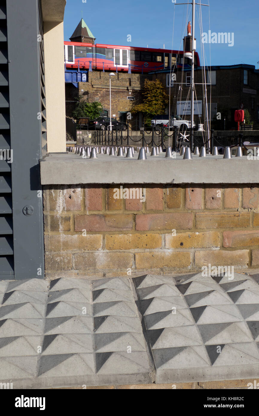 Anti-homeless spikes and rough surfaces installed in a luxury housing ...