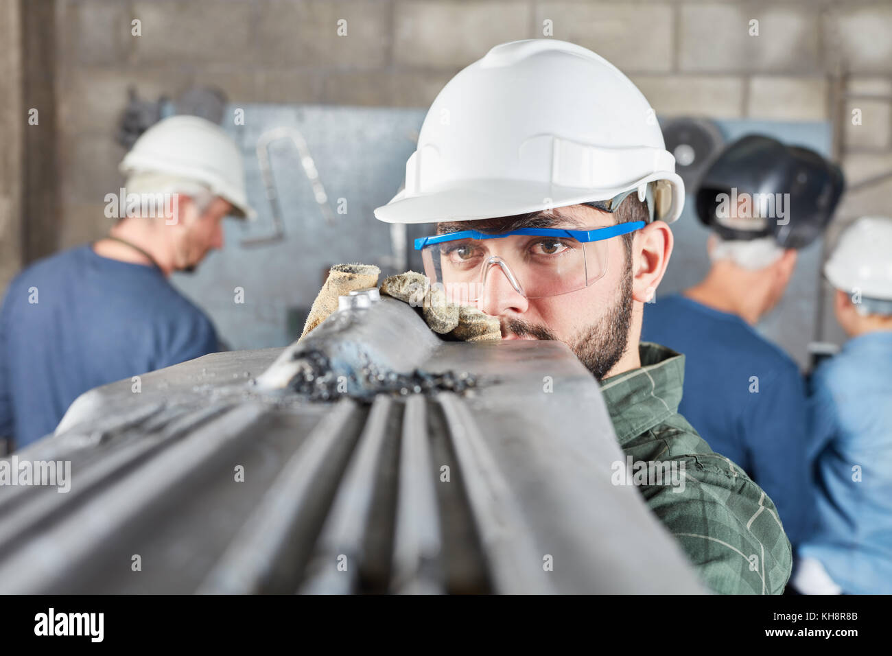 Worker makes production quality control in metallurgy factory Stock ...