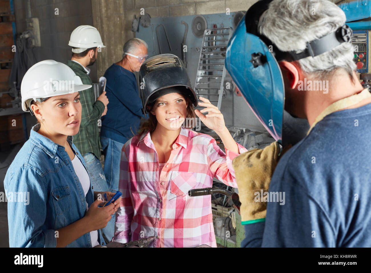 Apprentice of welder learn in apprenticeship lesson in metallurgy ...