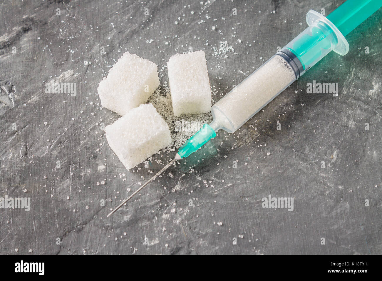 Sugar in a syringe. Conceptual depiction of dependence on the sweet ...