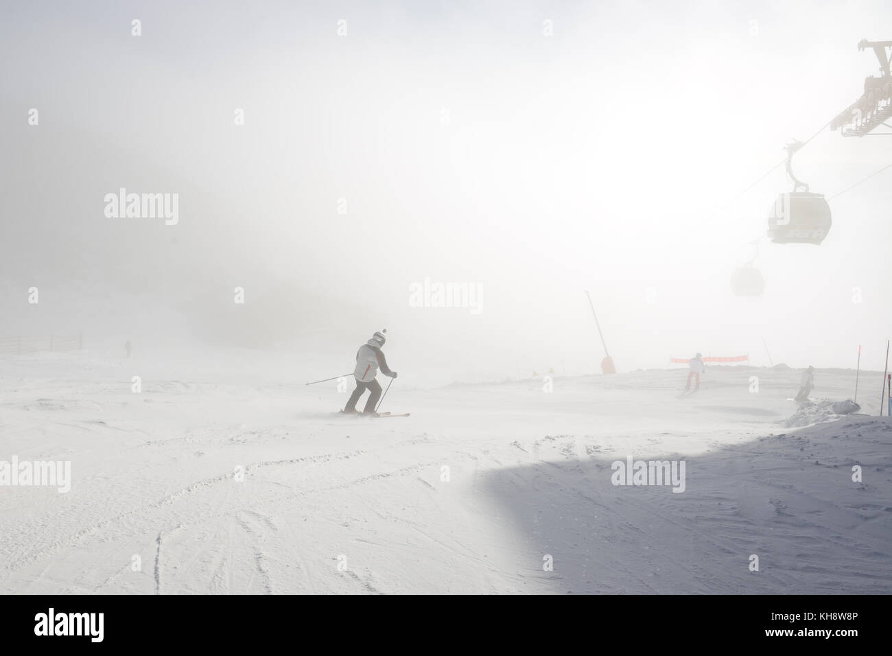 JASNA, SLOVAKIA - JANUARY 23: The skiers and Rotunda cableway station ...