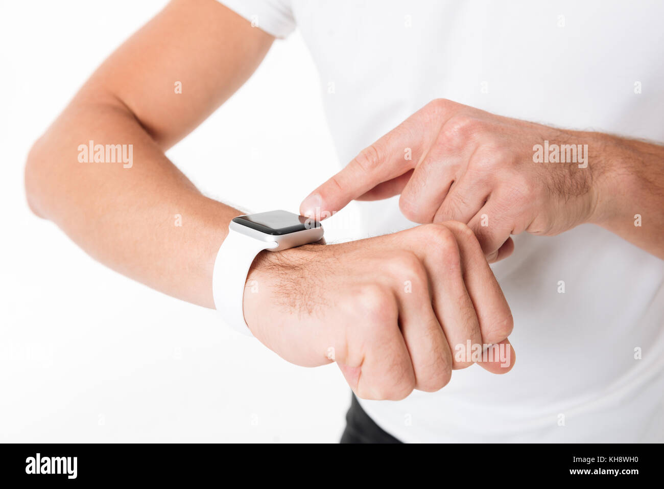 Close up portrait of a male hands pointing finger at smart watch ...