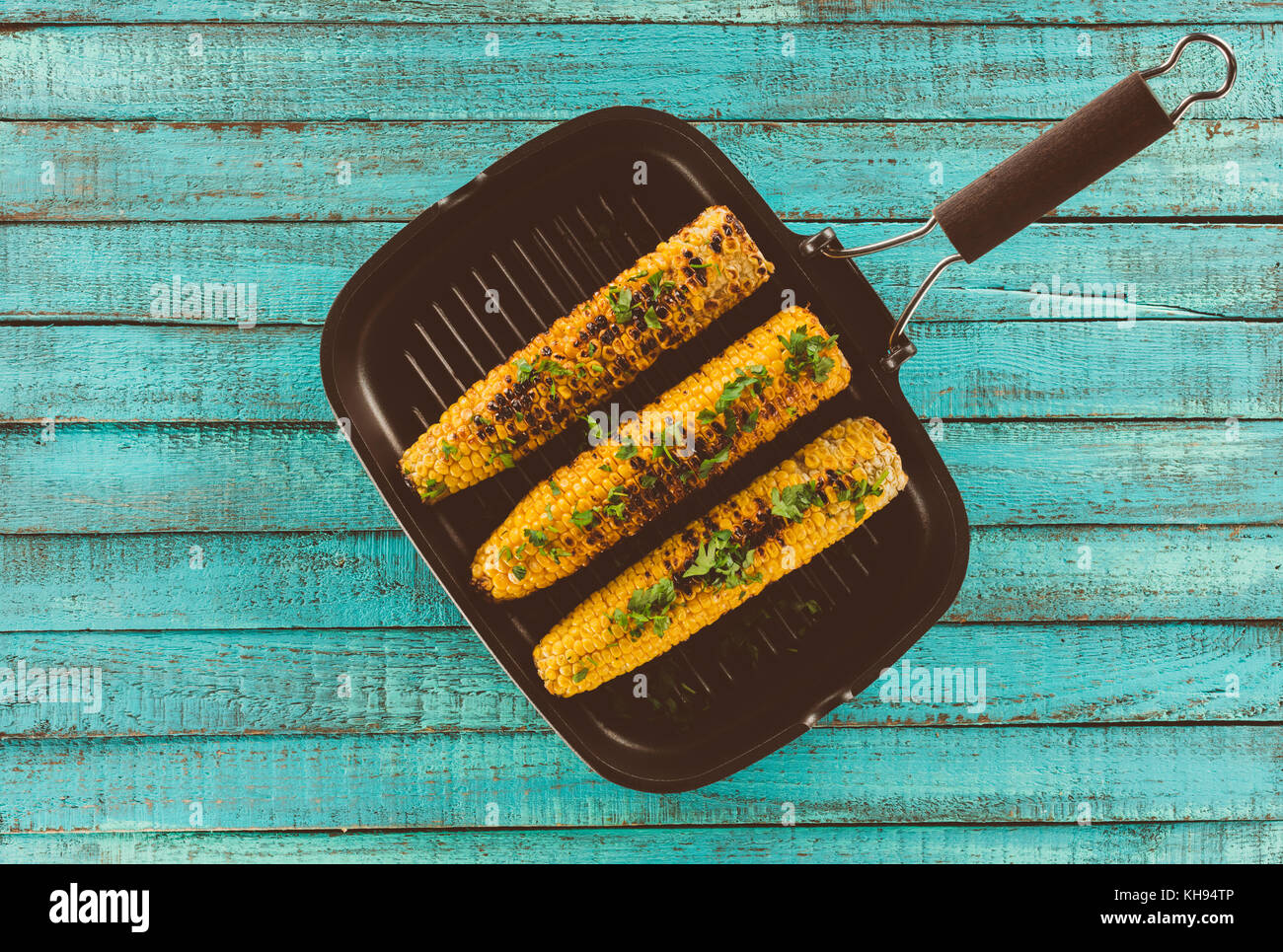 grilled corn on frying pan Stock Photo - Alamy