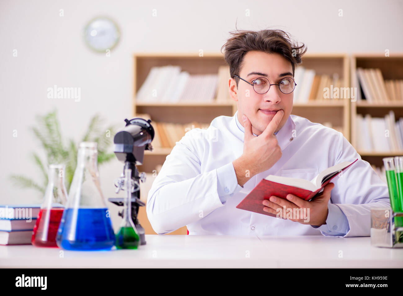 Mad crazy scientist doctor doing experiments in a laboratory Stock ...