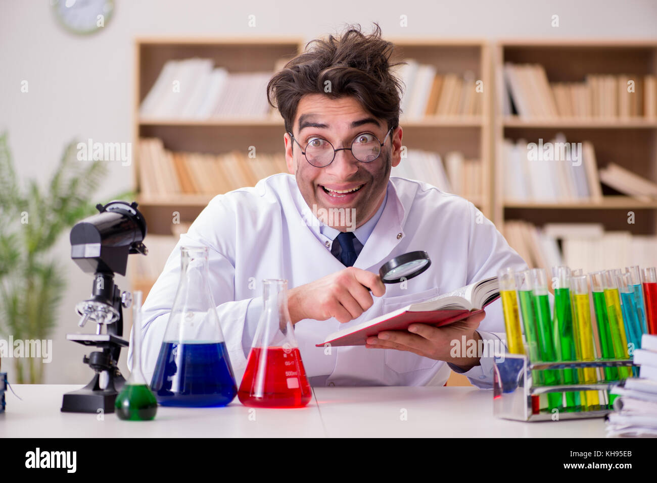 Mad crazy scientist doctor doing experiments in a laboratory Stock ...