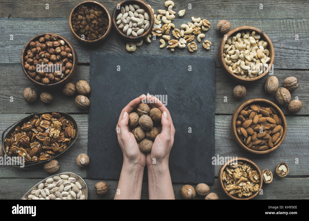 walnuts in hands Stock Photo - Alamy