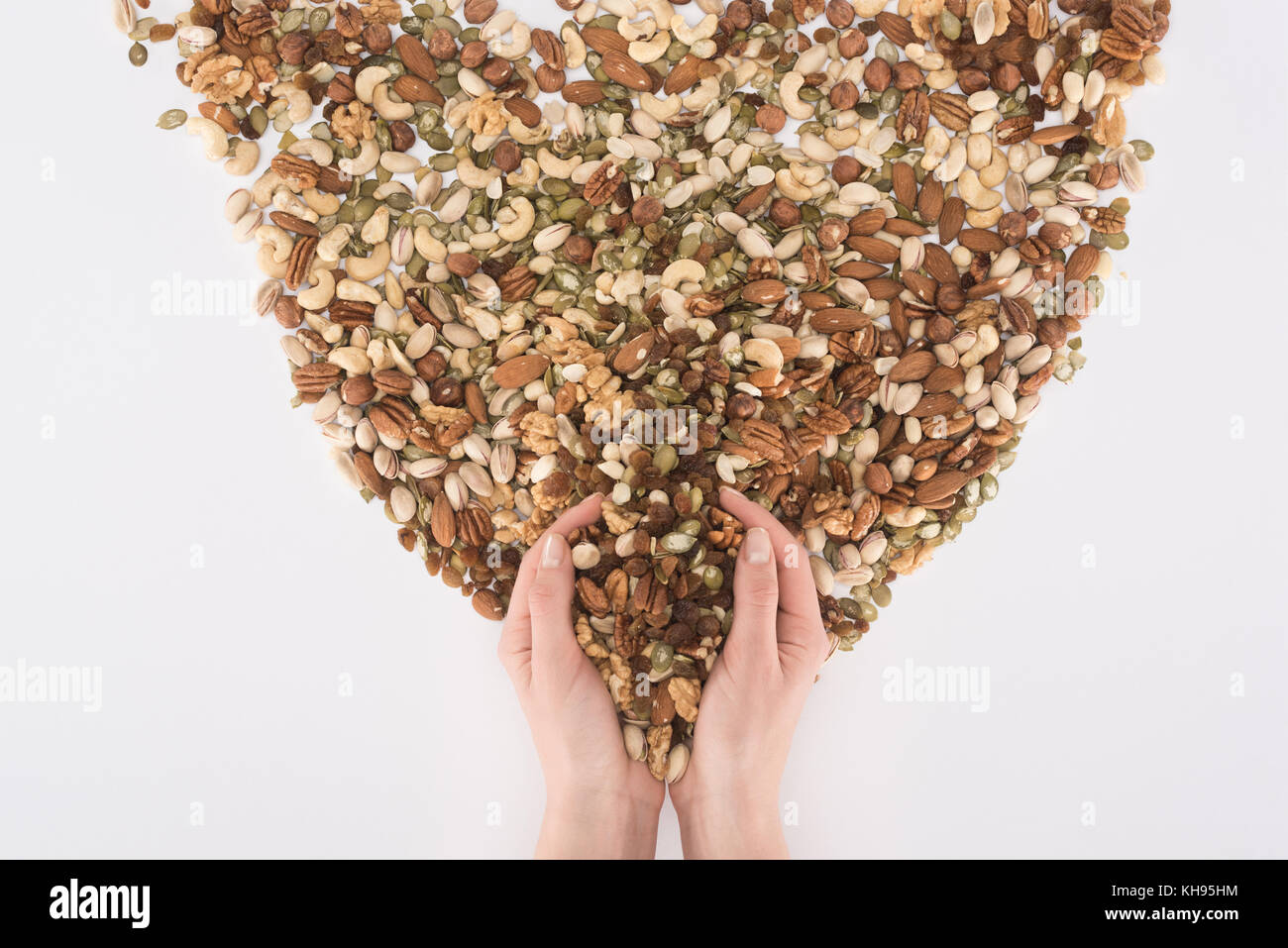 human hands and various nuts Stock Photo - Alamy
