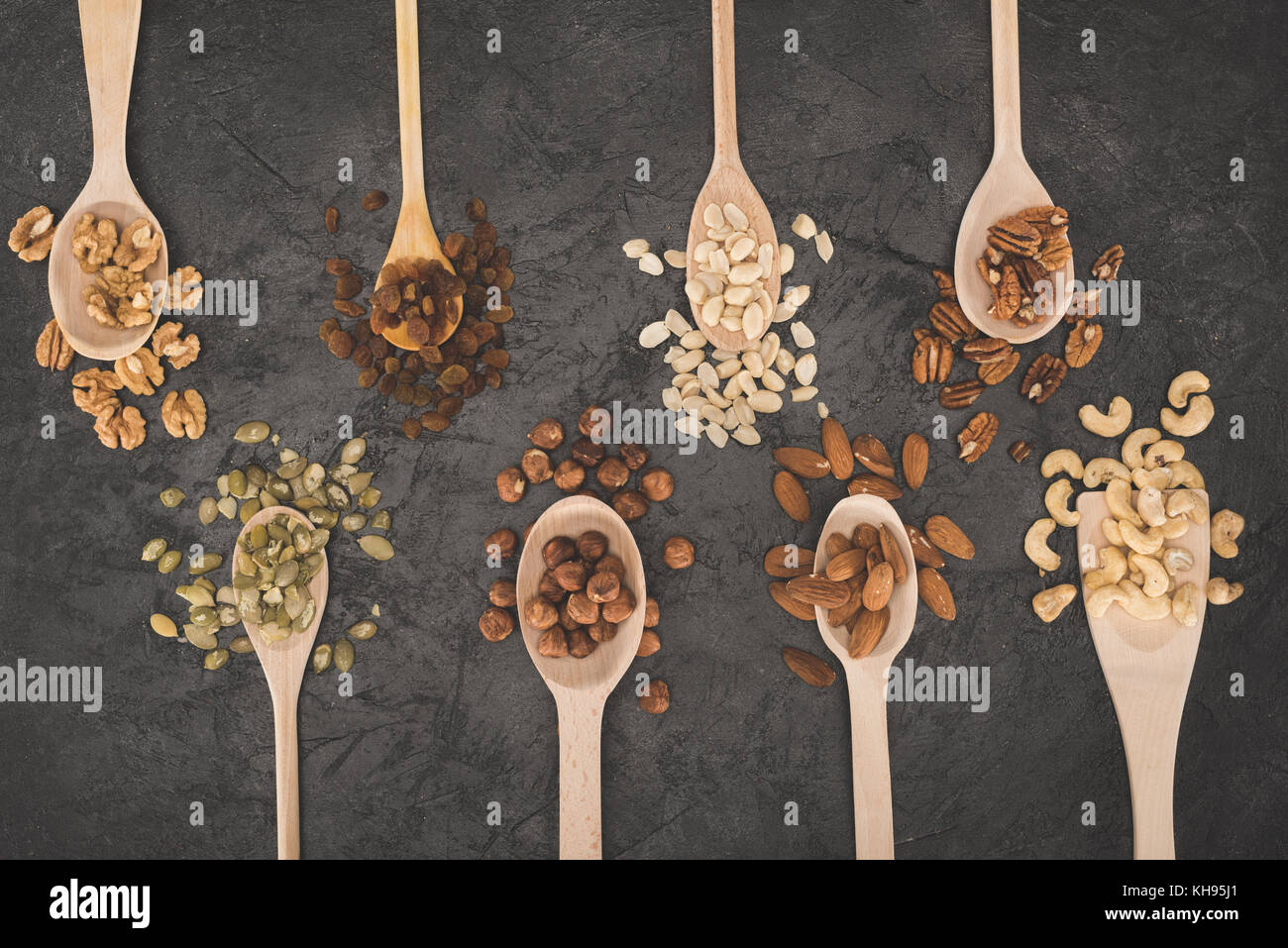 assorted nuts in spoons Stock Photo - Alamy