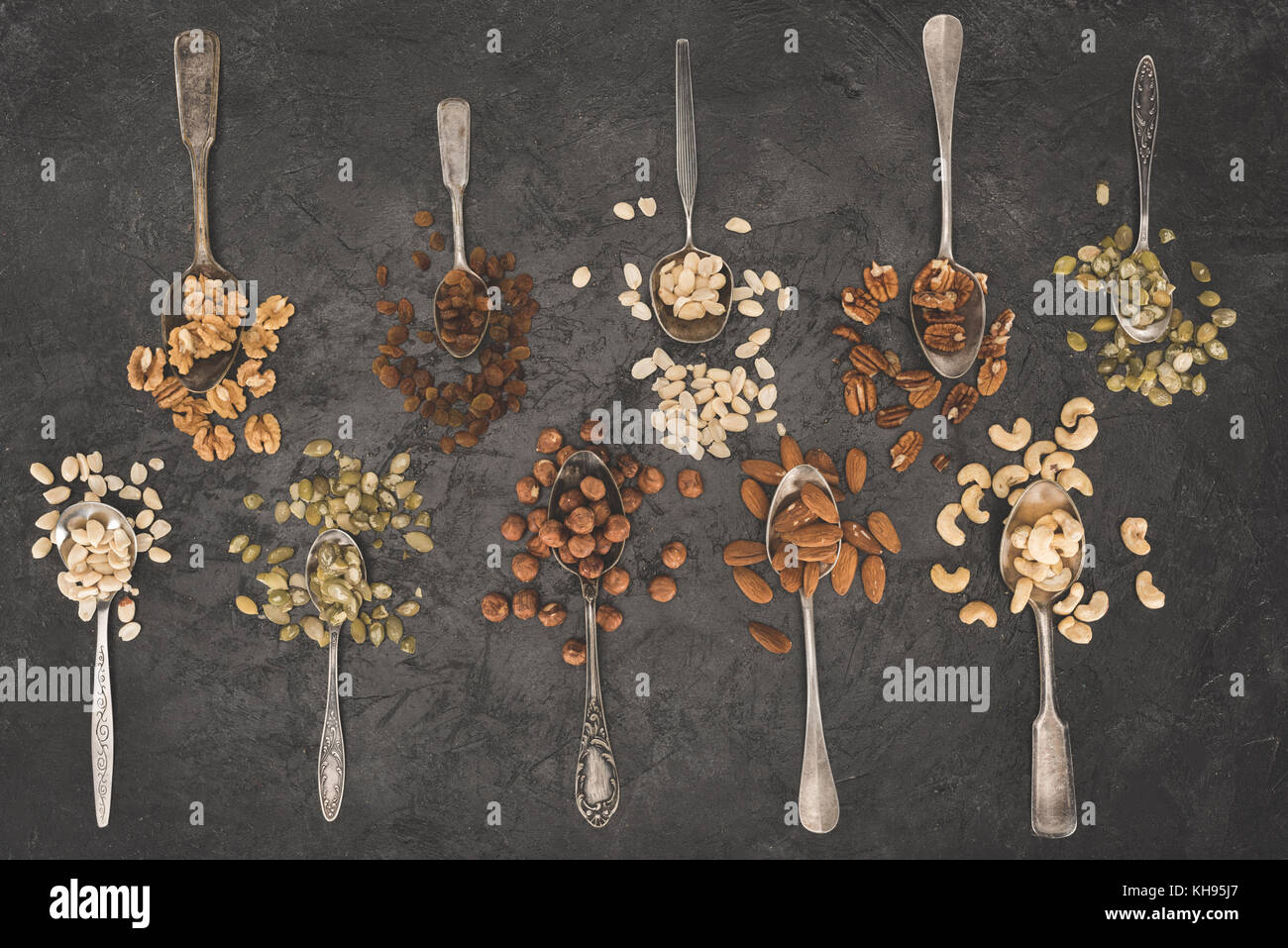 assorted nuts in spoons Stock Photo - Alamy